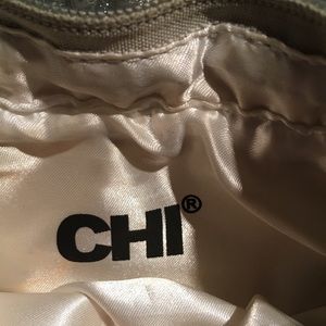 Chi | Bags | Chi Silver Clutch With Wrist Strap | Poshmark